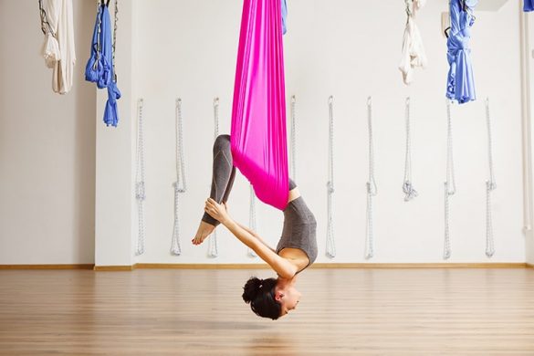 Take Your Workout To The Next Level By Knowing Aerial Yoga Benefits